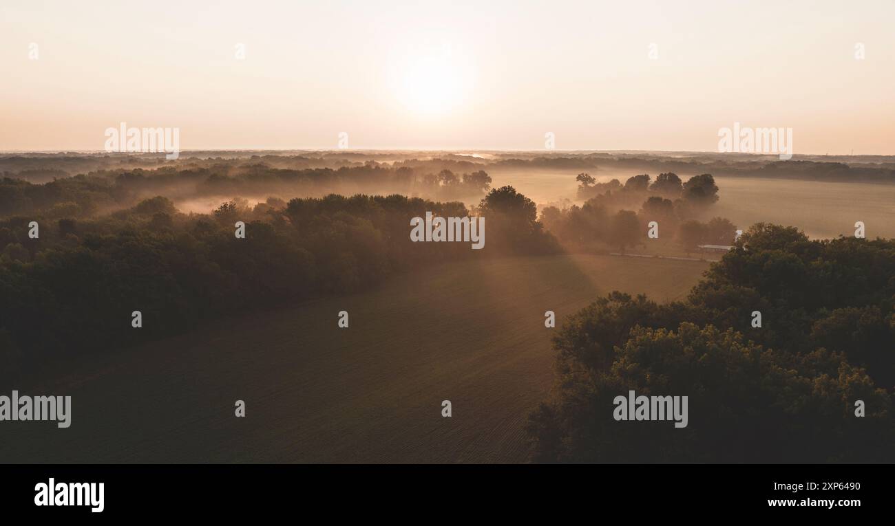 Misty sunrise over a farm in the rural American Midwest Stock Photo - Alamy