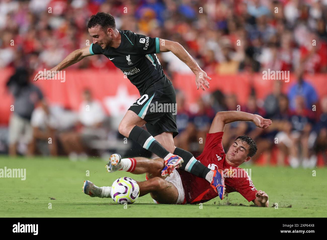 August 3, 2024: Liverpool forward Diogo Jota (20) is challenged by ...