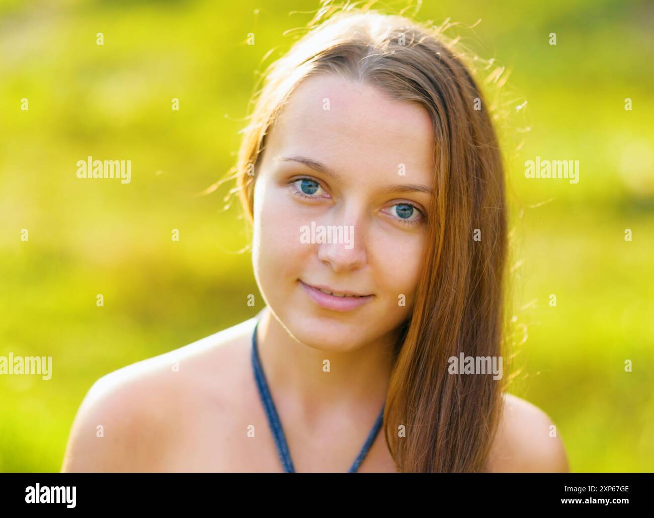 Portrait of young beautiful woman outdoors Stock Photo - Alamy