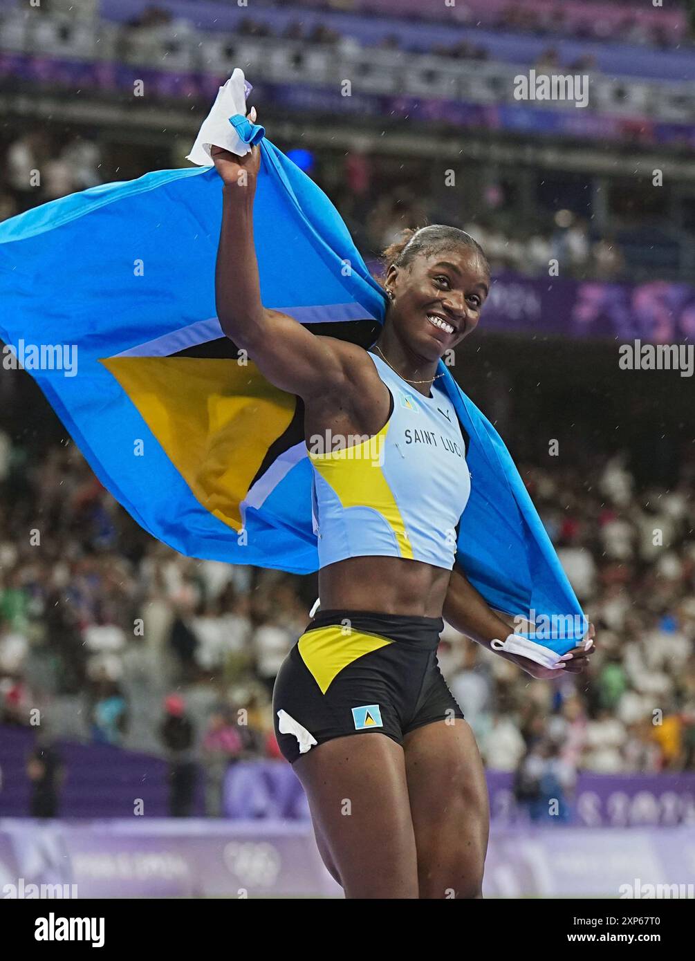 Saint Lucia's Julien Alfred celebrates after winning the women's 100 ...
