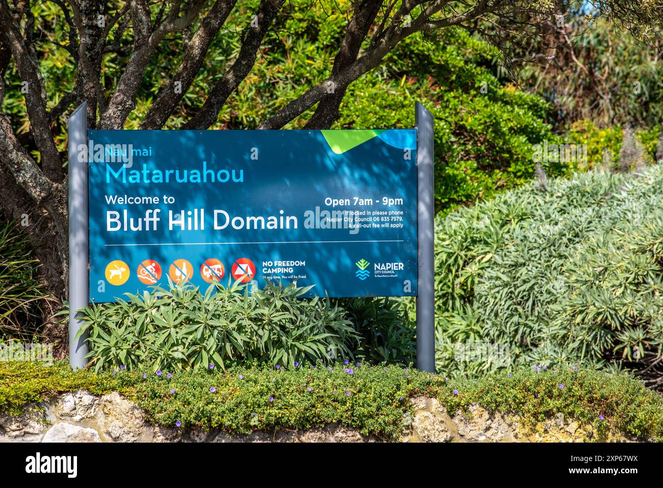 A sign for Bluff Hill Domain (Nau mai Matarruahou) a public area that ...