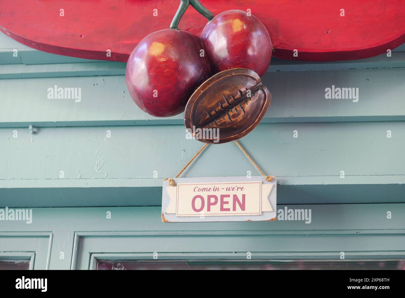 Open Sign with Cherry Decoration at a Cozy Caf Entrance Stock Photo - Alamy