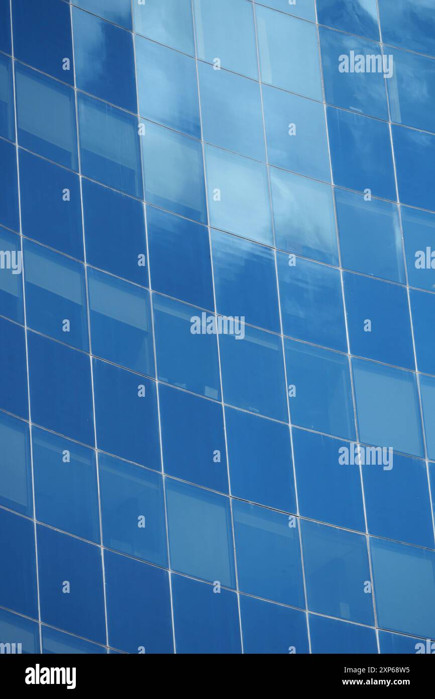 Thoughts on the Contemporary Glass Facade Featuring Striking Blue Tones ...