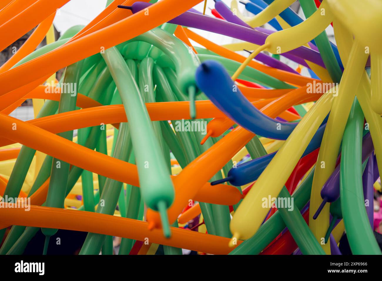 A group of vibrant balloons are linked with each other Stock Photo - Alamy