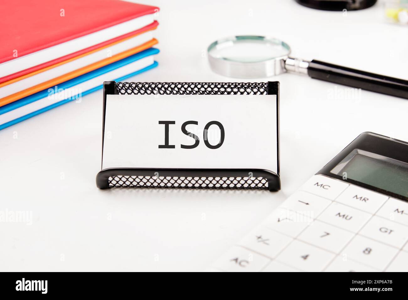 ISO service concept. ISO on a business card in a stand on a white ...