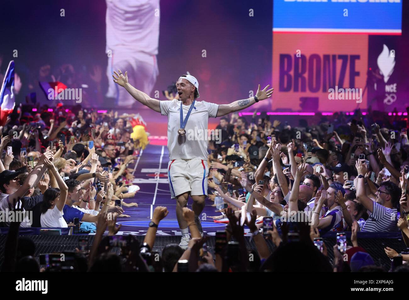 Romain Mahieu celebrate his bronze medal at the Club France, La Grande ...