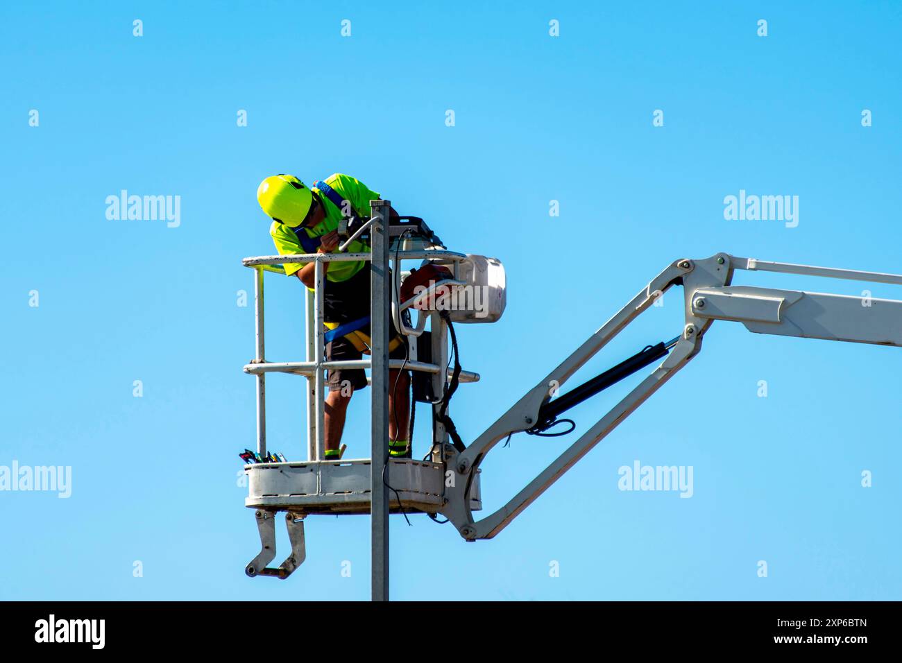 Electrician Working in a Boom Lift Stock Photo - Alamy