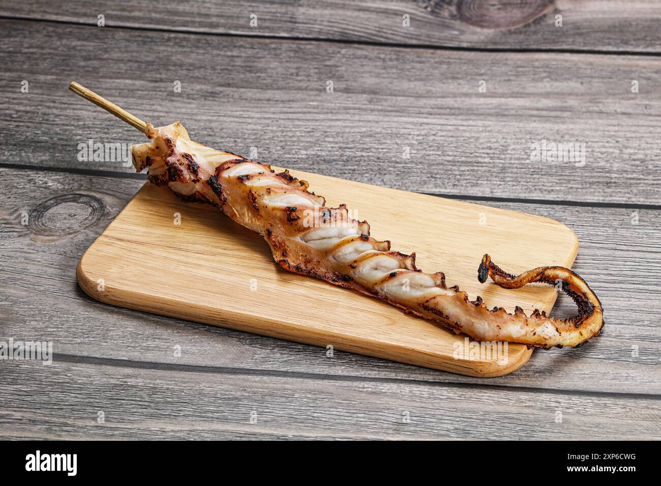 Delicous tasty Grilled octopus tentacle snack Stock Photo - Alamy