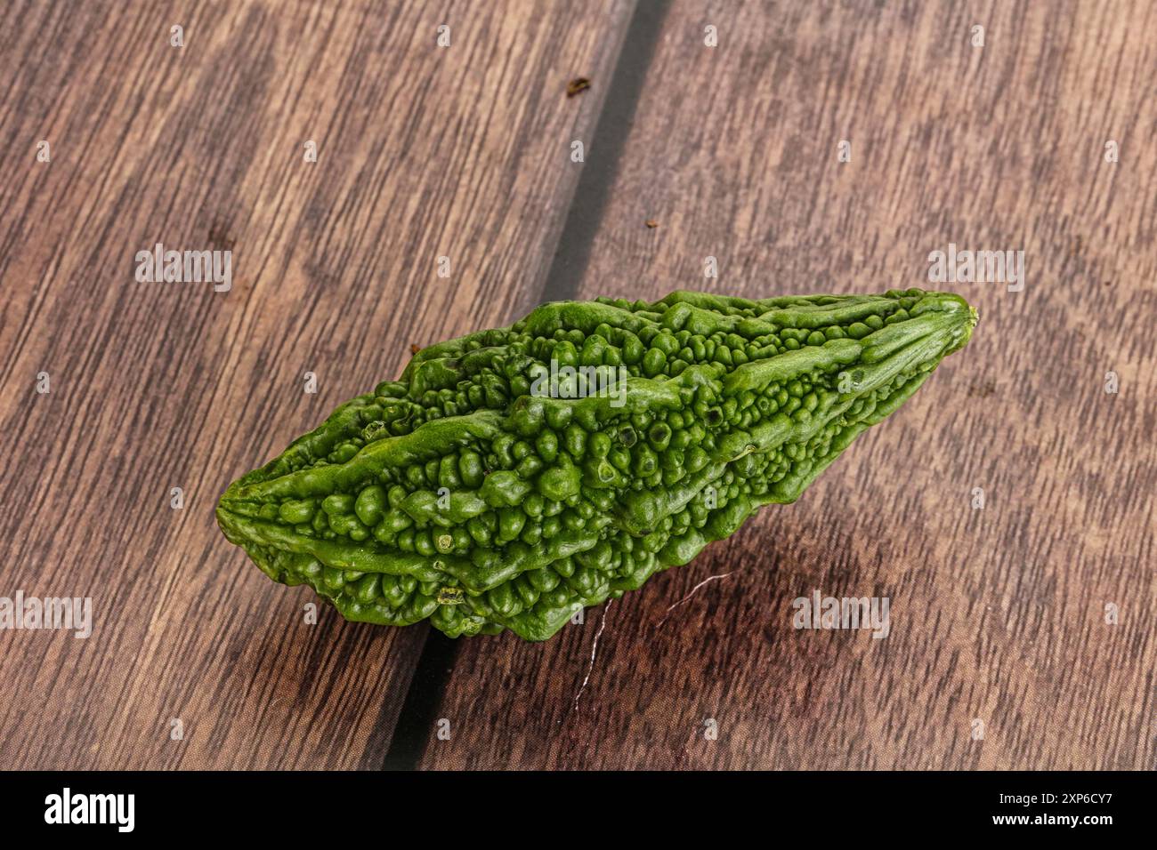 Green raw bitter lemon vegetables heap Stock Photo - Alamy