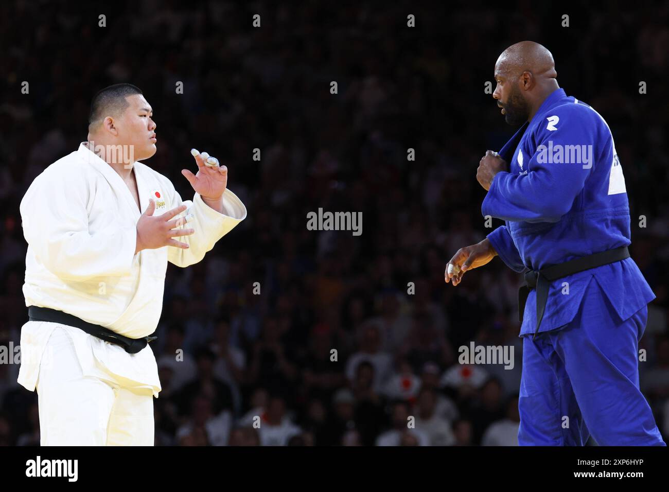 Paris, France. 3rd Aug, 2024. (L to R) Tatsuru Saito (JPN), Teddy Riner ...