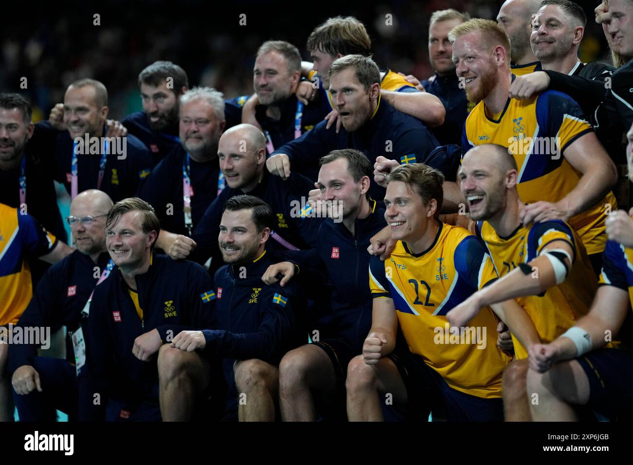Sweden team players pose for pictures after winning against Japan ...