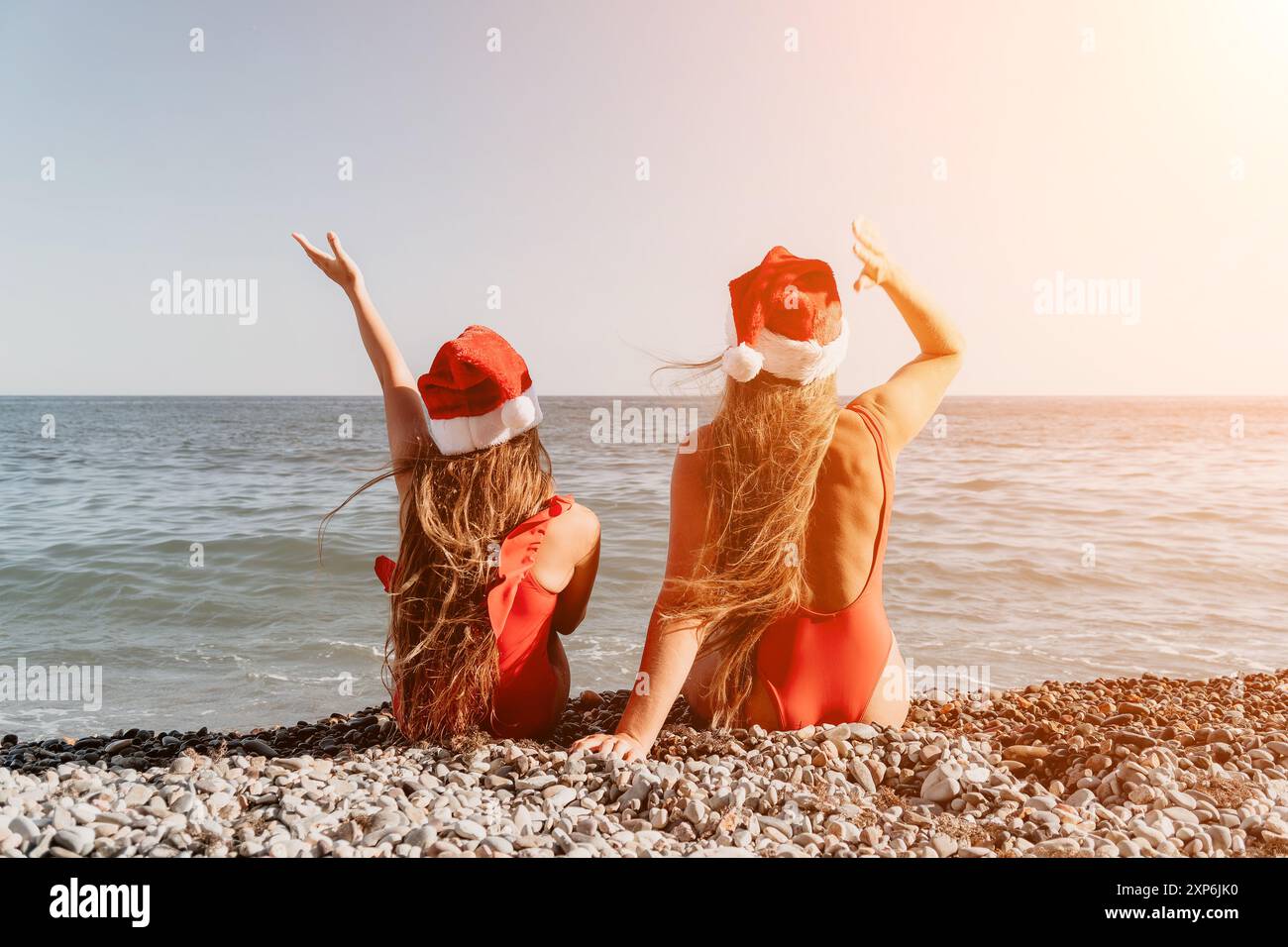 Women in colorful swimsuits hi-res stock photography and images - Alamy