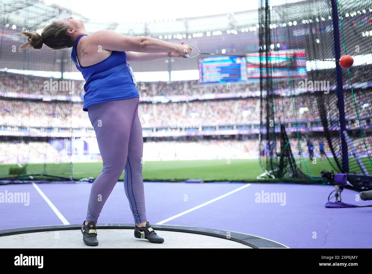 Erin Reese, of the United States, competes in the women's hammer throw ...