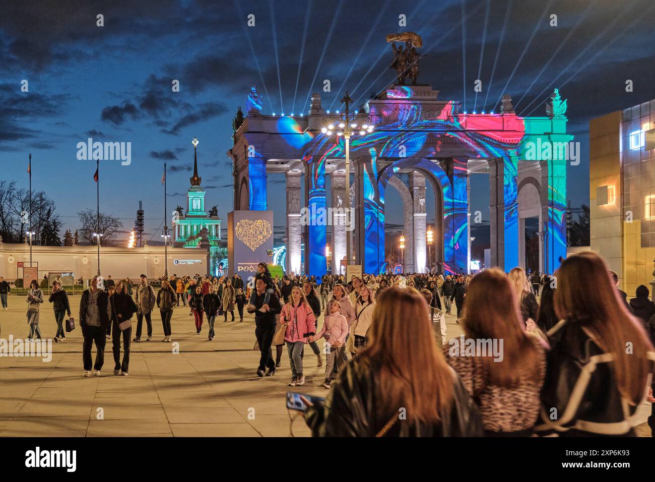 Moscow, Russia - April 13, 2024: Nightlife of city. Many people walking ...