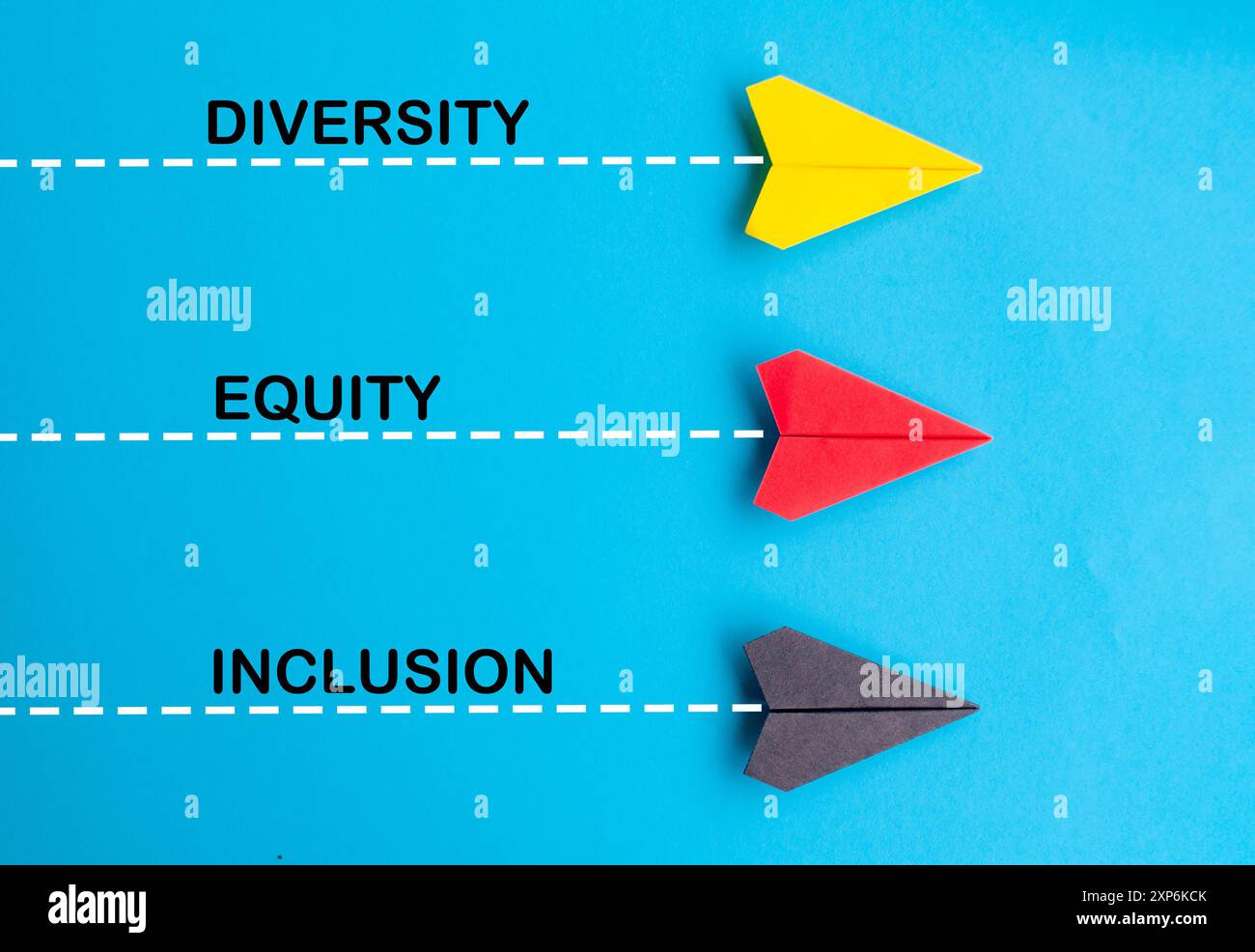 Top view of multicolored paper airplane with text, Diversity, Equity ...