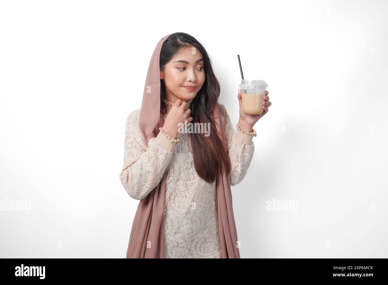 Portrait happy muslim woman drinking hi-res stock photography and ...