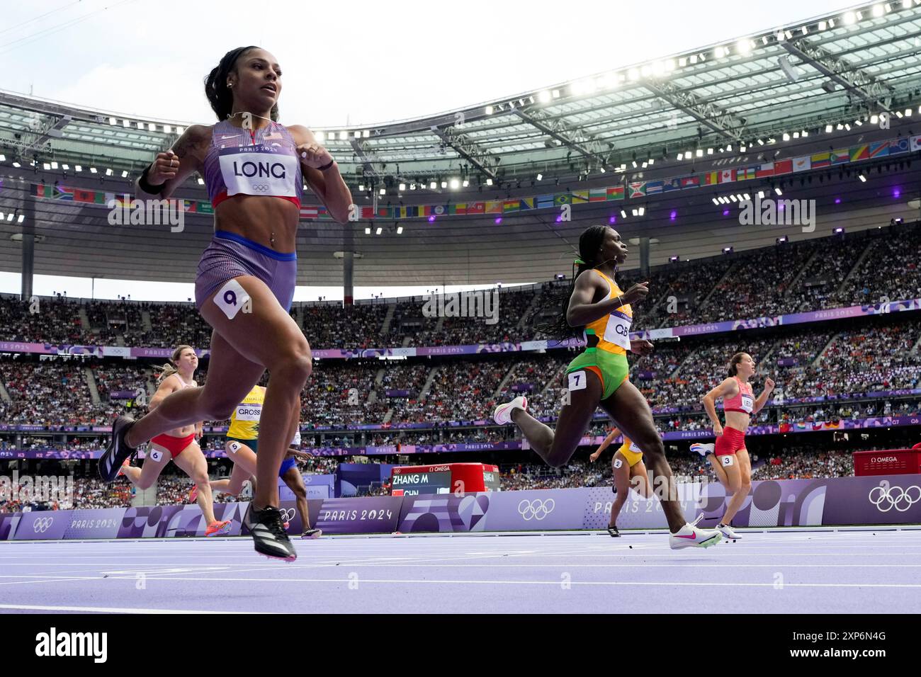 McKenzie Long, of the United States wins a heat in the women's 200 ...
