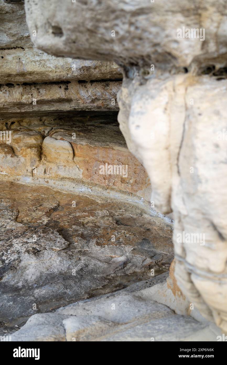 Patterns and textures of a rock wall with holes Stock Photo - Alamy