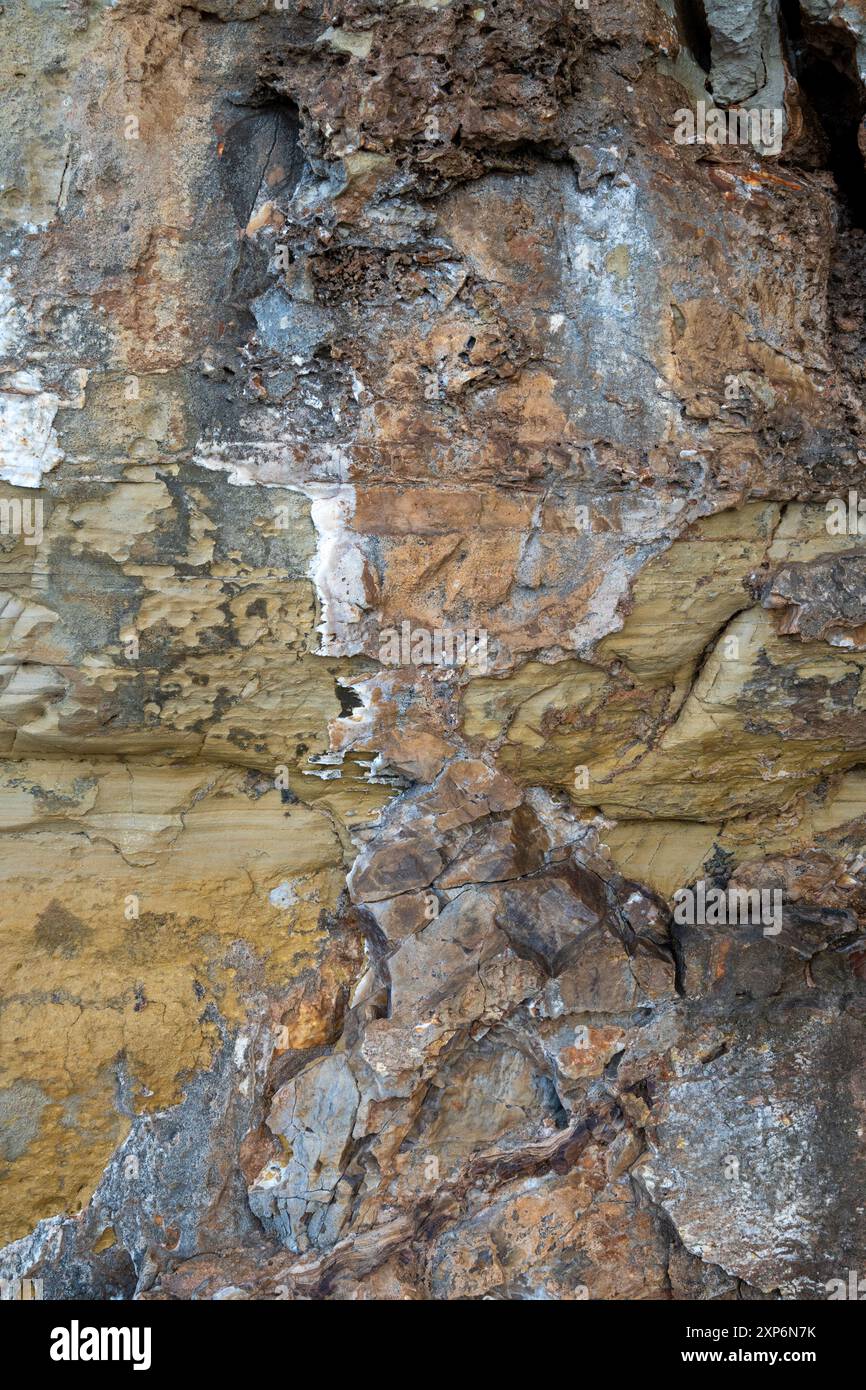 Patterns and textures of a rock wall with holes Stock Photo - Alamy
