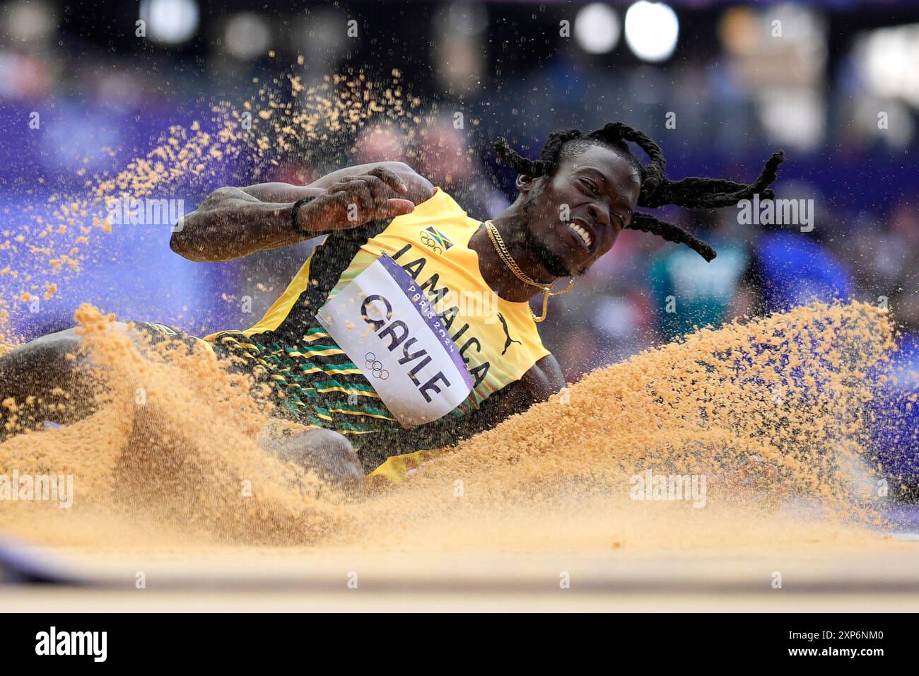 Tajay Gayle, of Jamaica, competes in the men's long jump qualification ...
