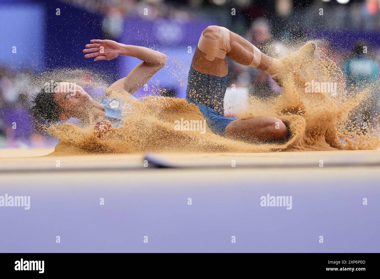 Yu-Tang Lin, of Taiwan, competes in the men's long jump qualification ...
