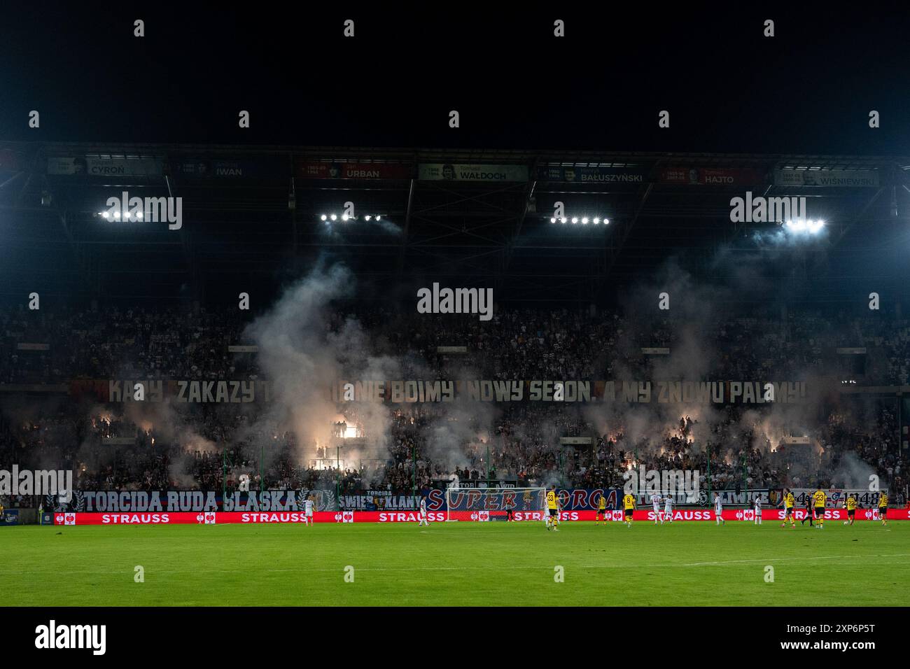 Zabrze, Polska 2 Sierpien 2024 - ultras fans set up flares of Gornik ...