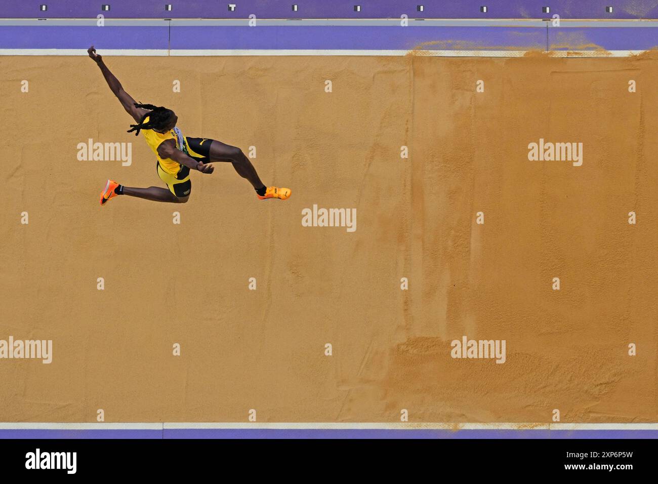 Tajay Gayle, of Jamaica, competes in the men's long jump qualificaton ...