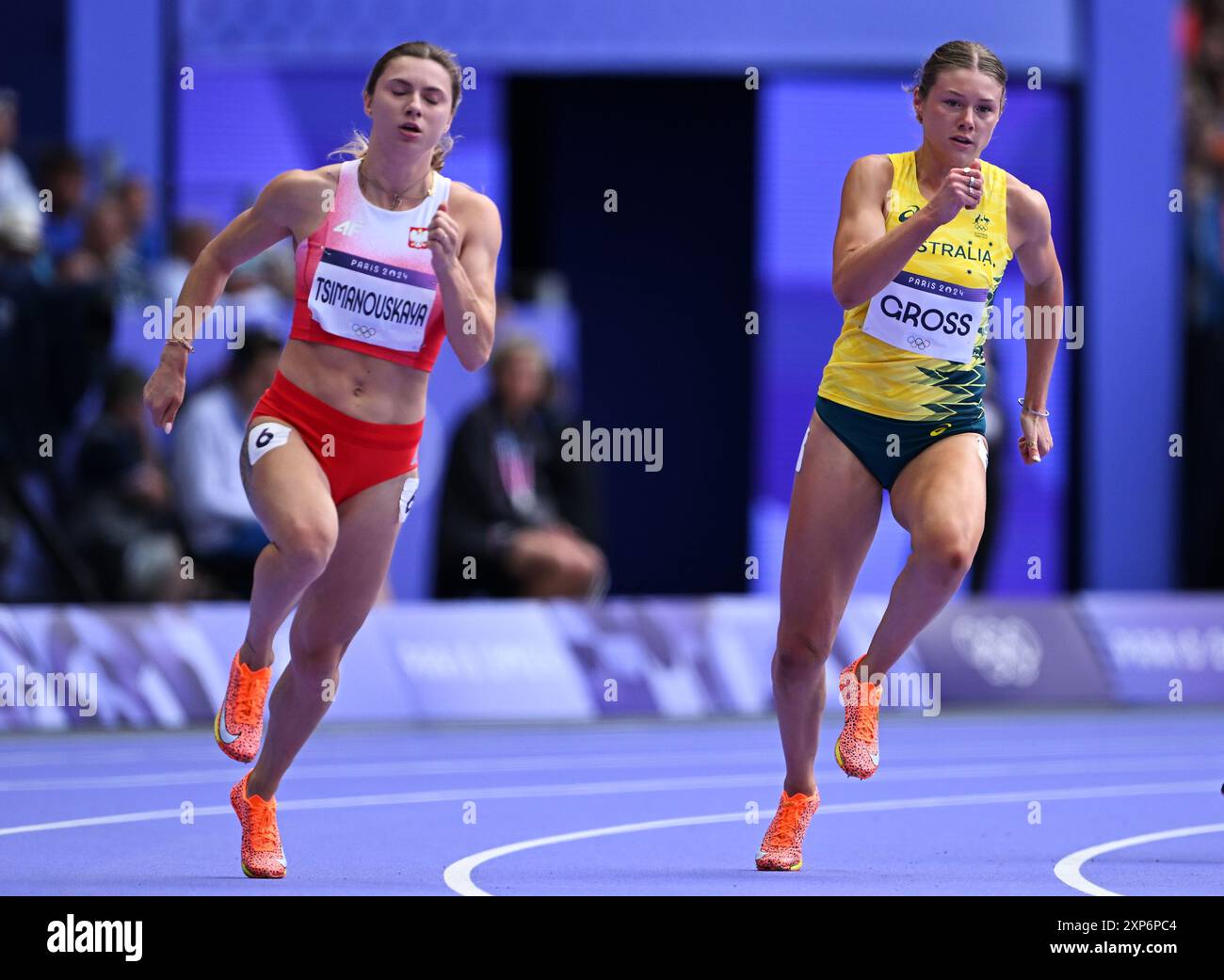 Saint Denis, France. 04th Aug, 2024. Australian runner Mia Gross (right) races in the Women's ...