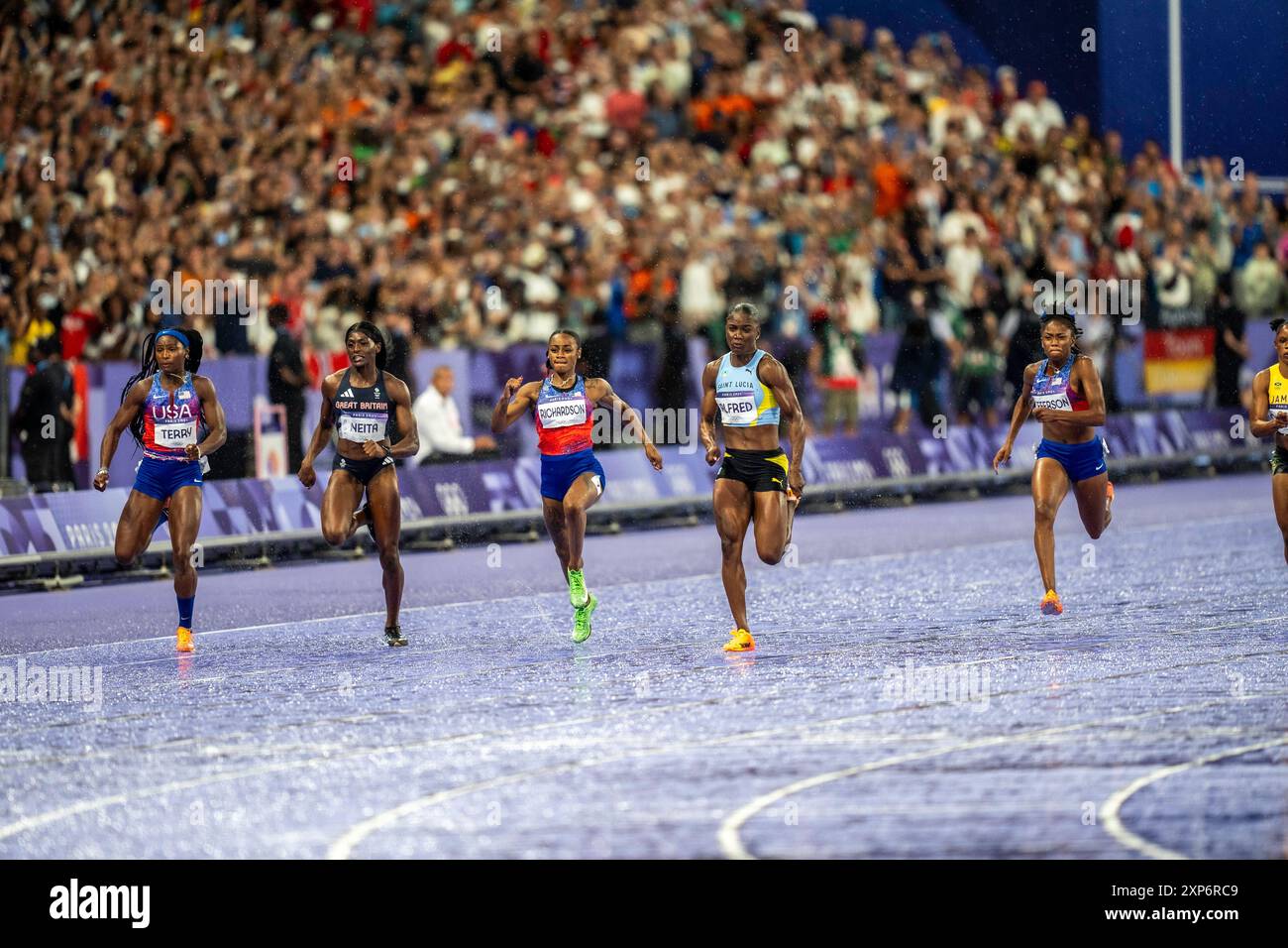 Julien Alfred (LCA) competing in the Womens 100m Final, wins the gold ...
