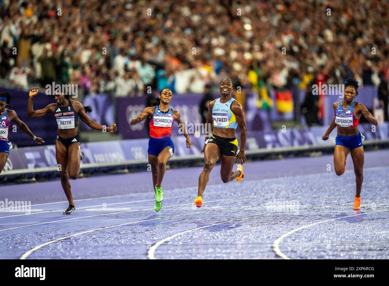 Julien Alfred (LCA) competing in the Womens 100m Final, wins the gold ...