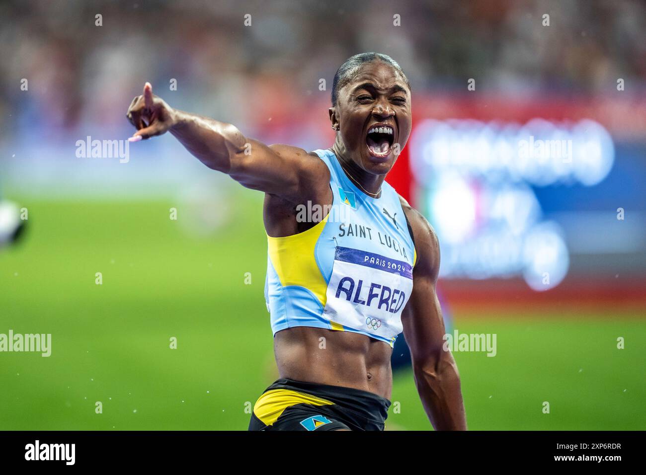 Julien Alfred (LCA) competing in the Womens 100m Final, wins the gold ...