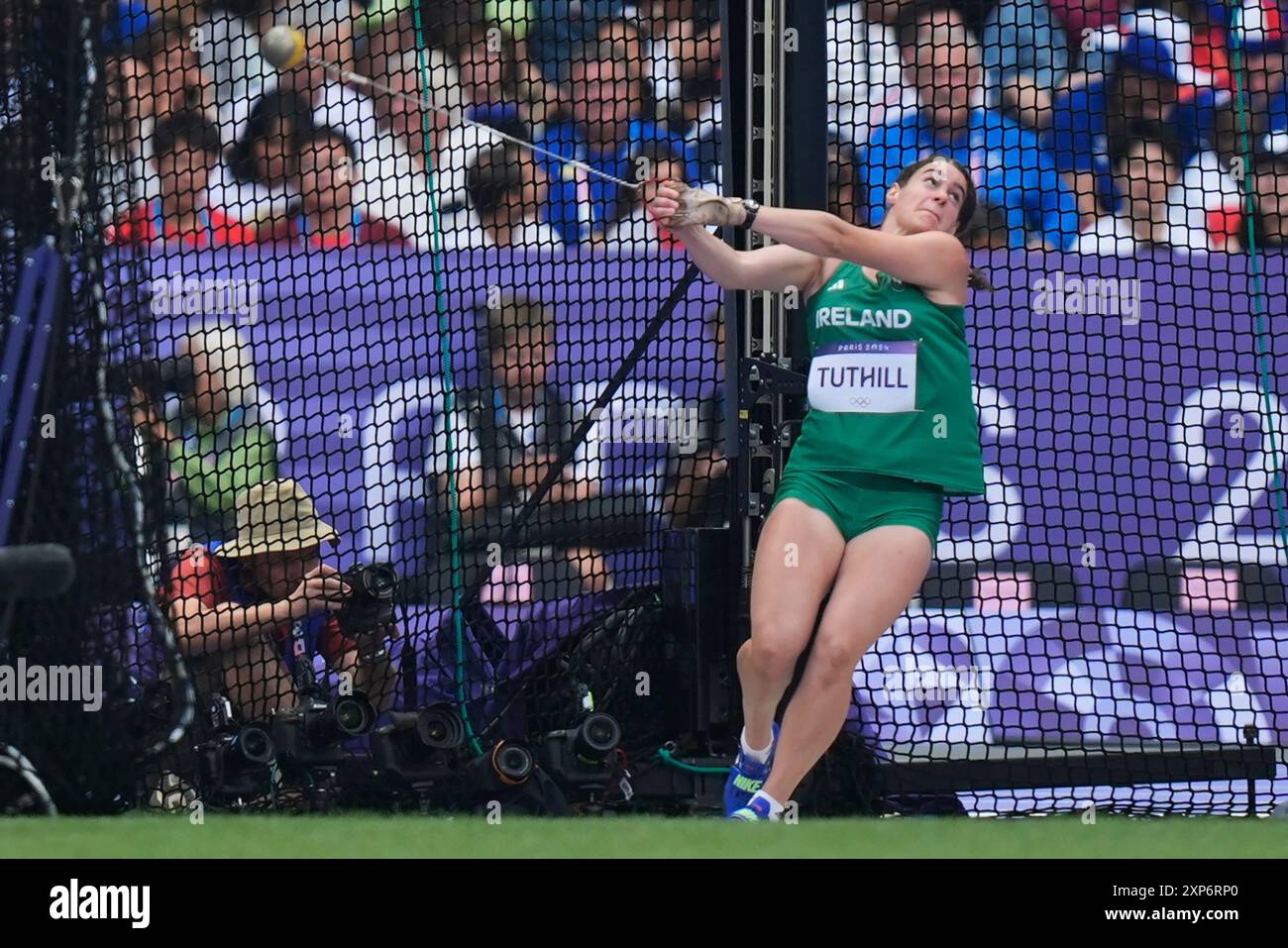Nicola Tuthill, of Ireland, competes in the women's hammer throw ...