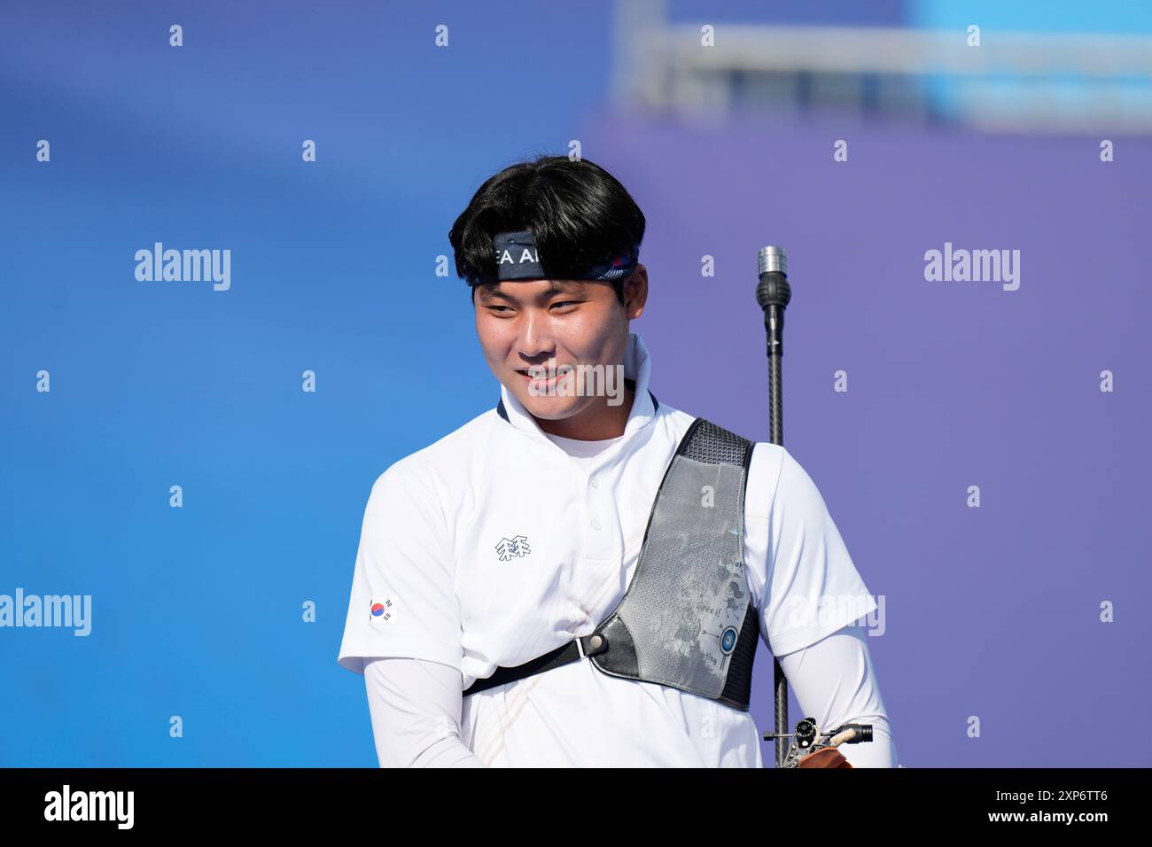 South Korea's Wooseok Lee looks on during the Archery individual quarterfinal against China at ...