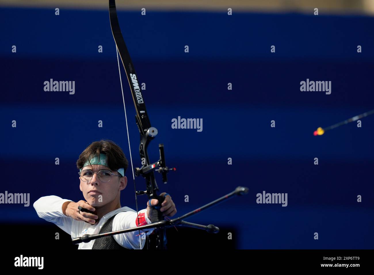 France's Baptiste Addis shoots during the Archery individual ...