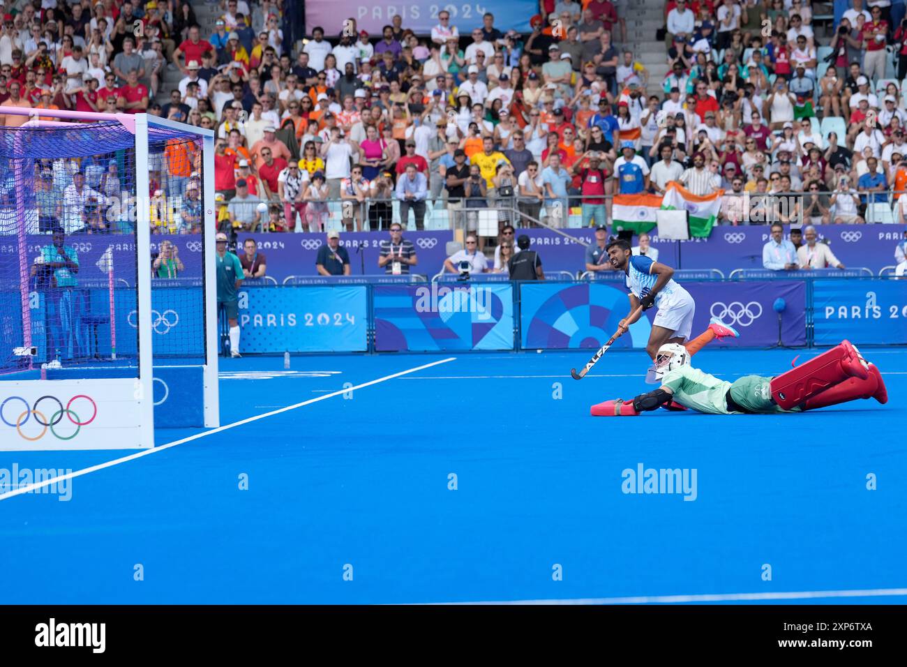 India's Rajkumar Pal scores winning goal in the shoot-out during the ...