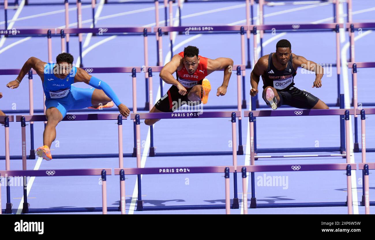 Great Britain's Tade Ojora (right) during the Men's 110m Hurdles heats ...