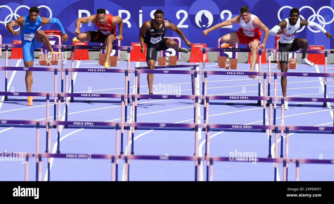 Great Britain's Tade Ojora (centre) during the Men's 110m Hurdles heats ...