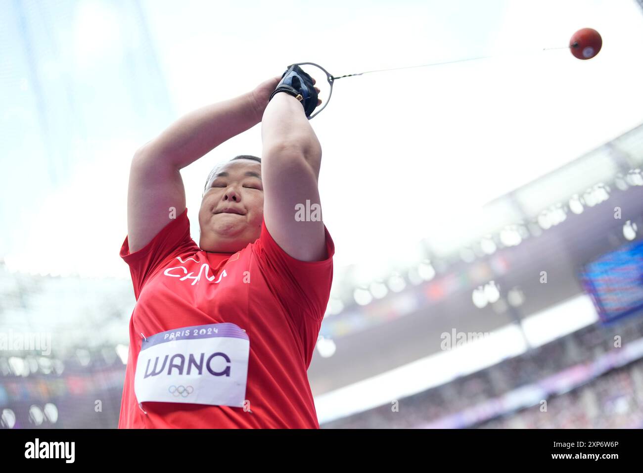 Wang Zheng, of China, competes in the women's hammer throw ...