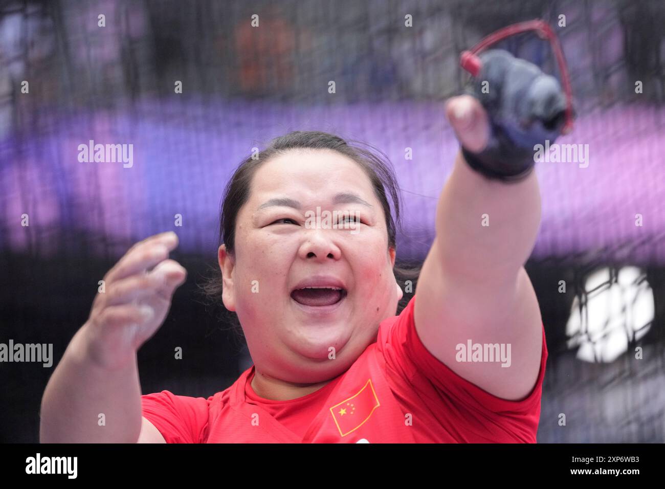 Wang Zheng, of China, competes in the women's hammer throw ...