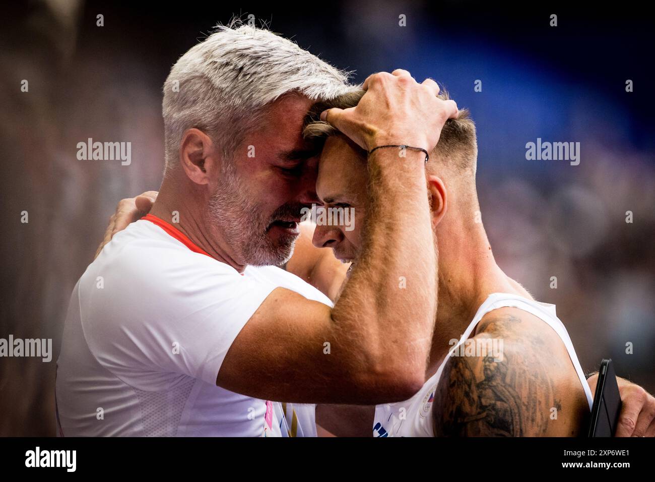 Paris olympic coach and athlete hi-res stock photography and images - Alamy