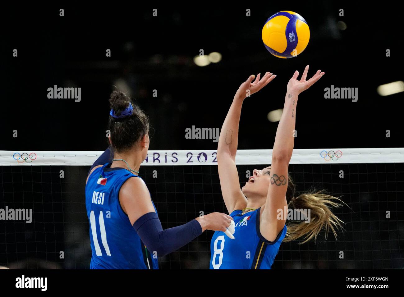 Alessia Orro of Italy, right, sets the ball to Anna Danesi during the ...