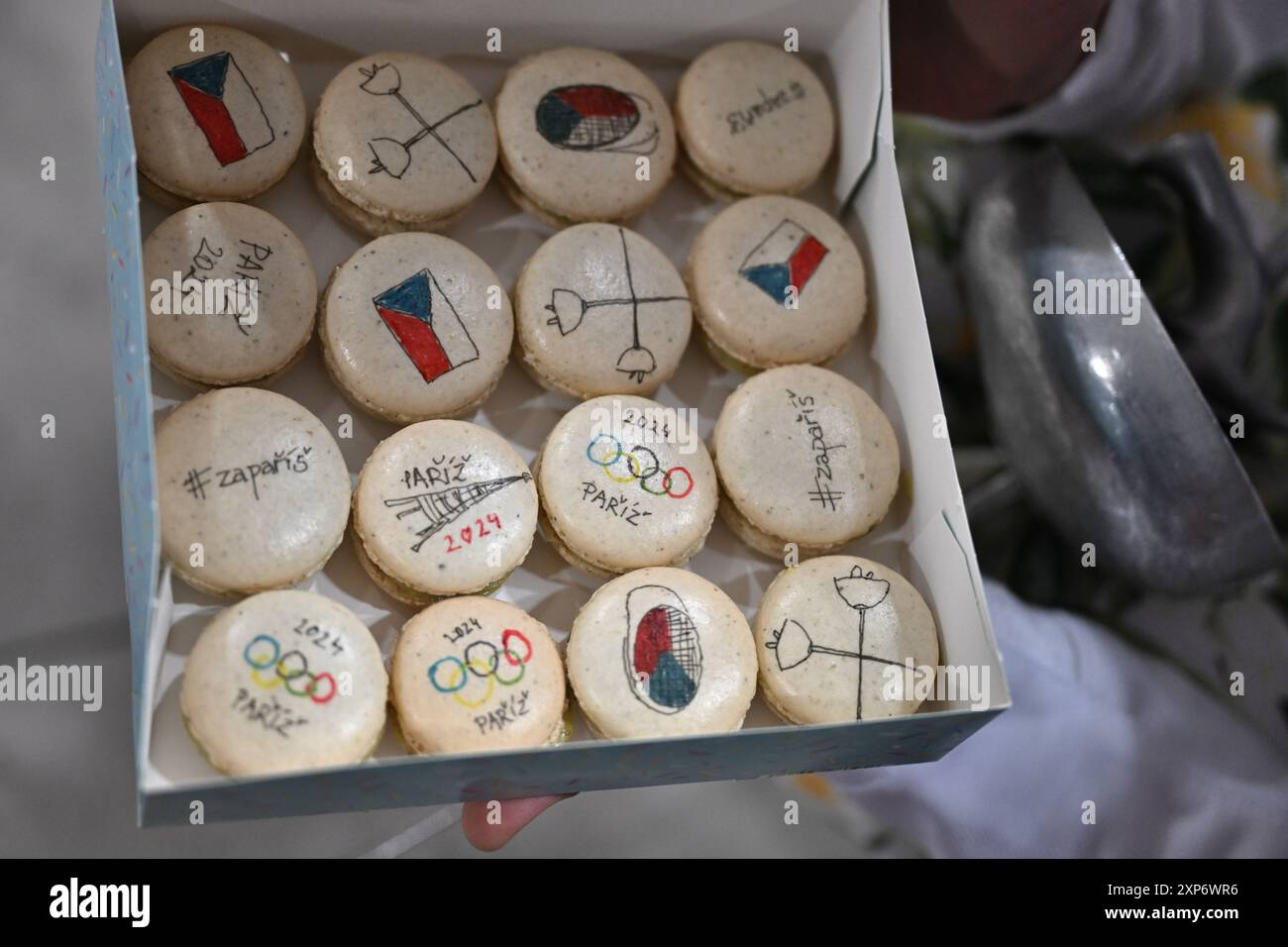 Prague, Czech Republic. 04th Aug, 2024. Fans with sweets with Olympic ...