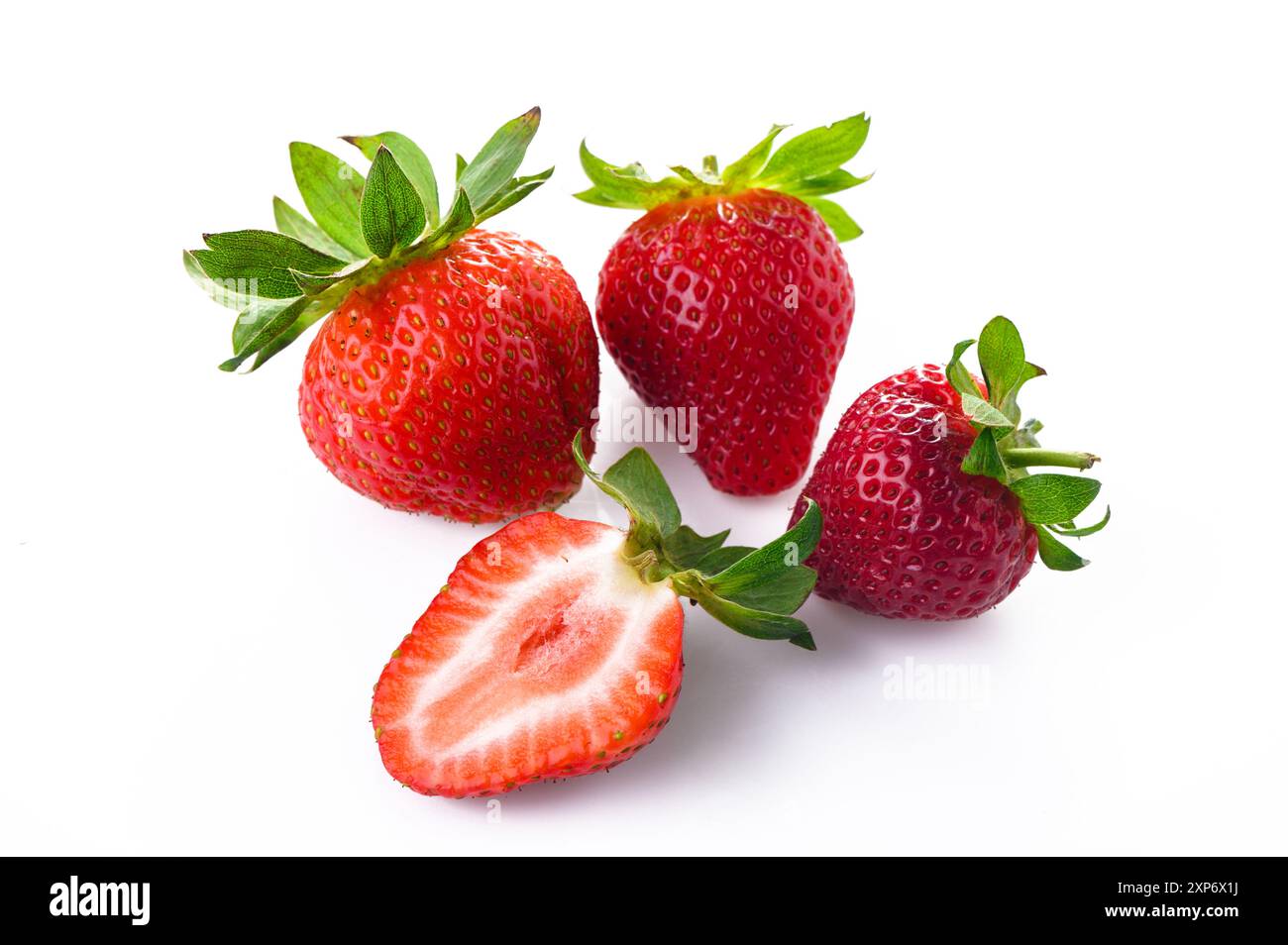 Set of ripe strawberries. Whole and cut berries isolated on white ...