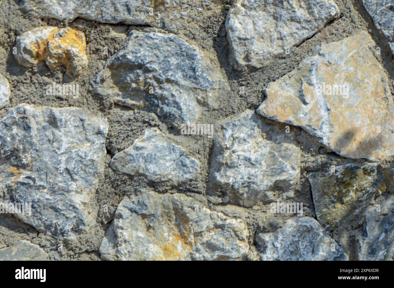 real stone wall as background Stock Photo - Alamy