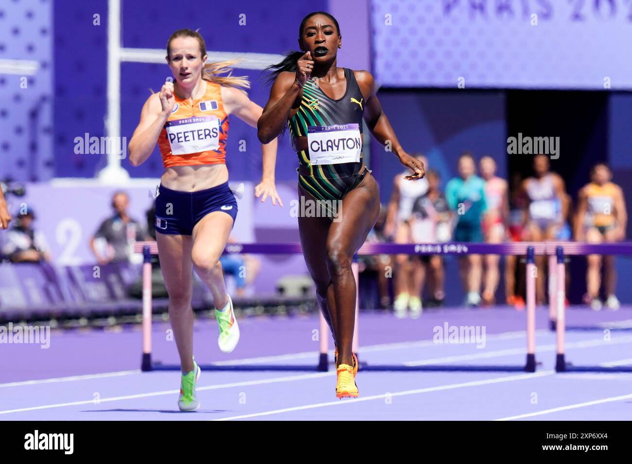 Rushell Clayton, of Jamaica, wins a heat in the women's 400-meter ...