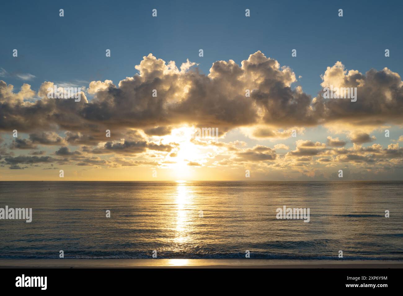 Dramatic sunset sky. sea. Calm sea with sunset sky through the clouds over. Sunset ocean and sky ...