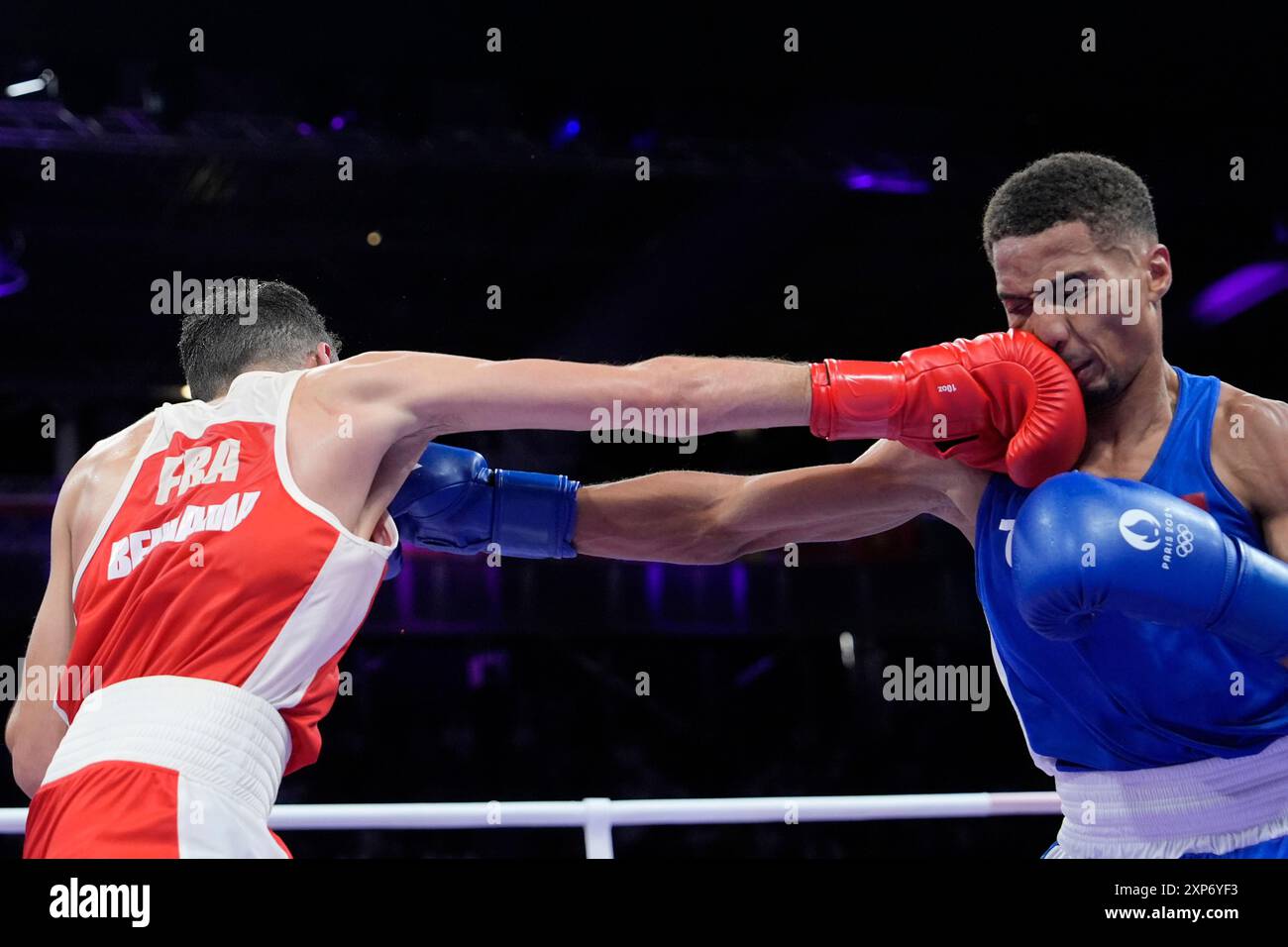 France's Billal Bennama hits Dominican Republic's Yunior Alcantara in ...