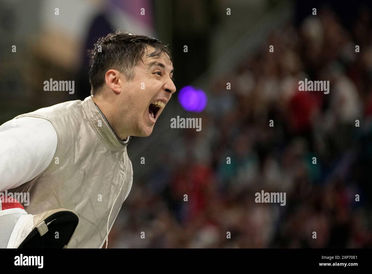 United State's Alexander Massialas celebrates after winning the men's ...