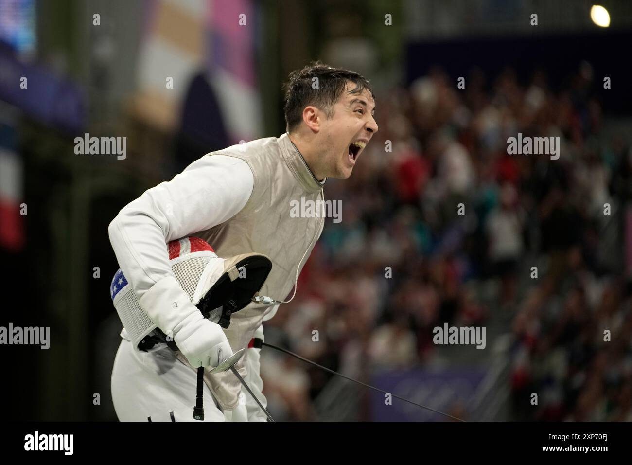 United State's Alexander Massialas celebrates after winning the men's ...