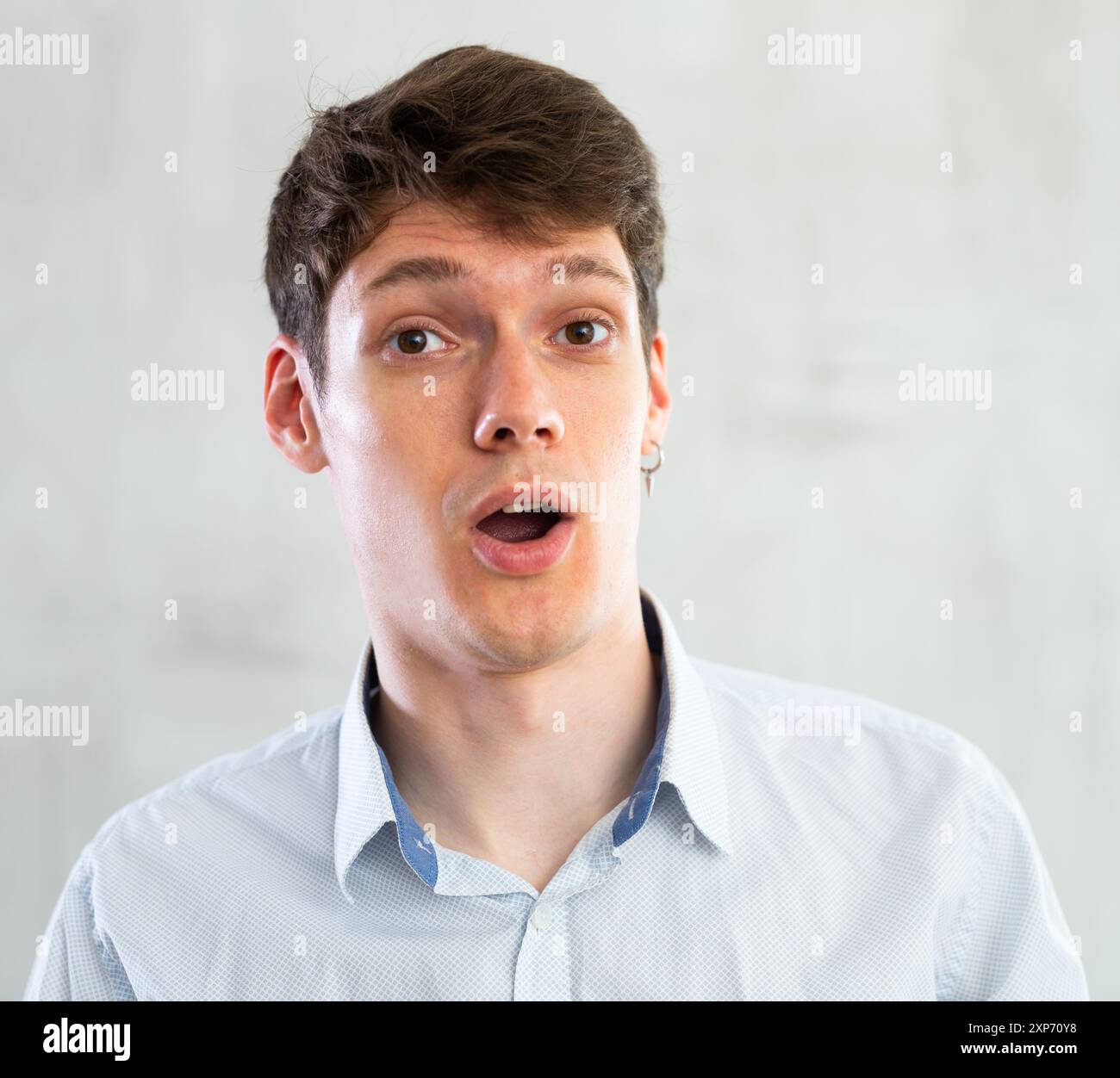 Emotions, people and positive concept man expresses different on gray ...